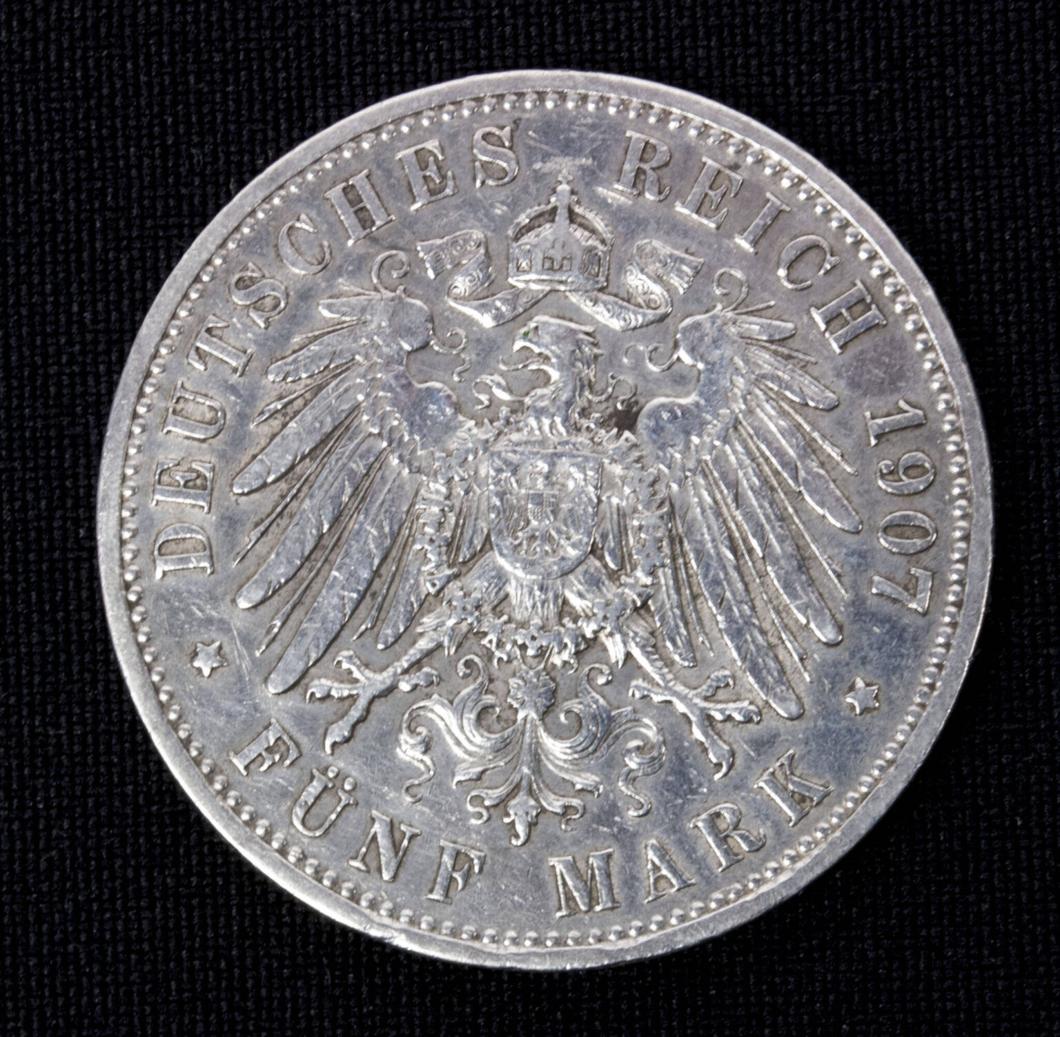 German coins: 1907, 1912, 1936, 1936, 1937