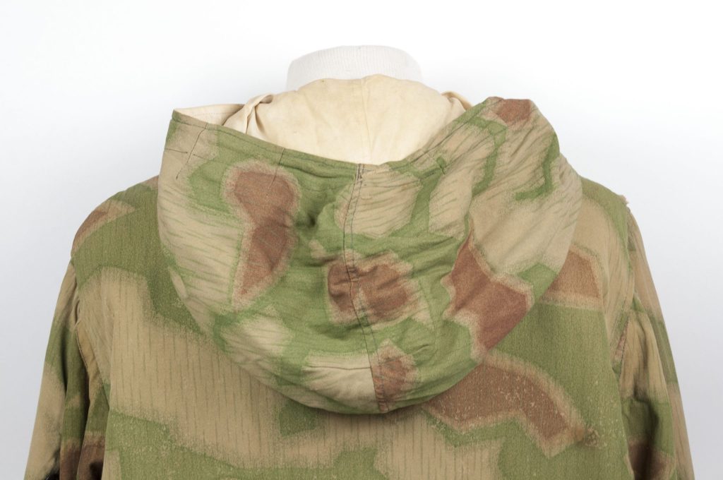 Reversible “Sumpftarn” winter parka with swamp camouflage pattern
