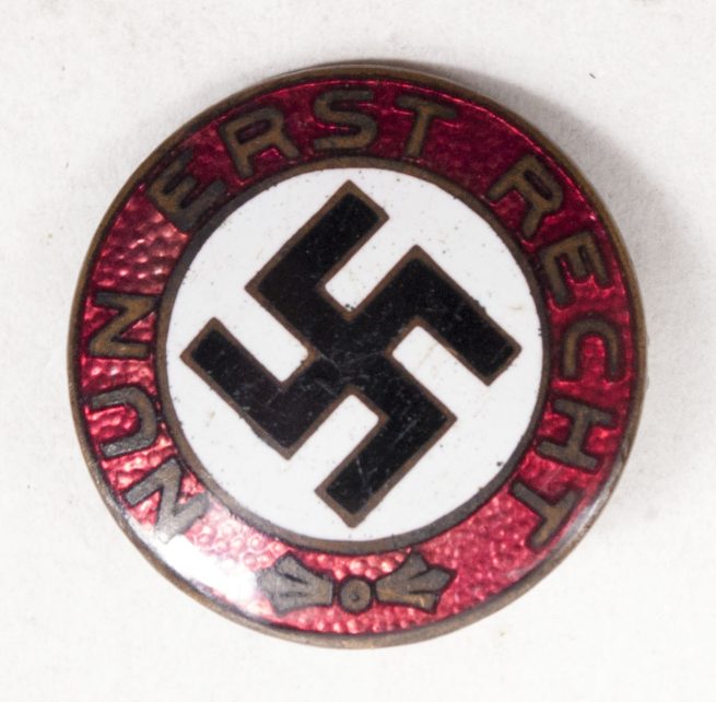 (Slogan) Full size NSDAP “Nun Erst Recht” badge